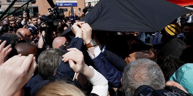 French Secret Service protect President Macron with £8000 umbrella ...